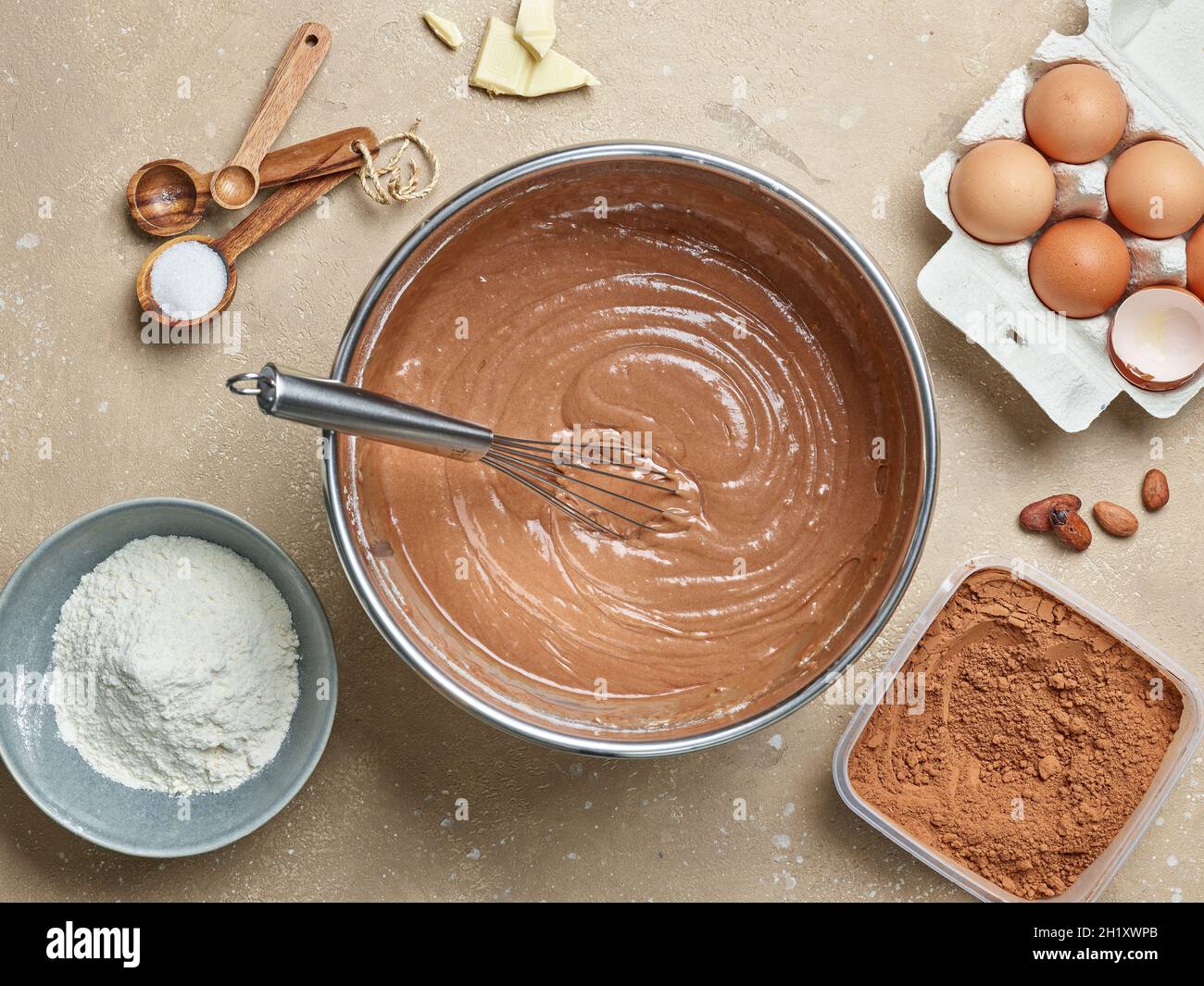 various baking ingredients on kitchen table, top view Stock Photo - Alamy