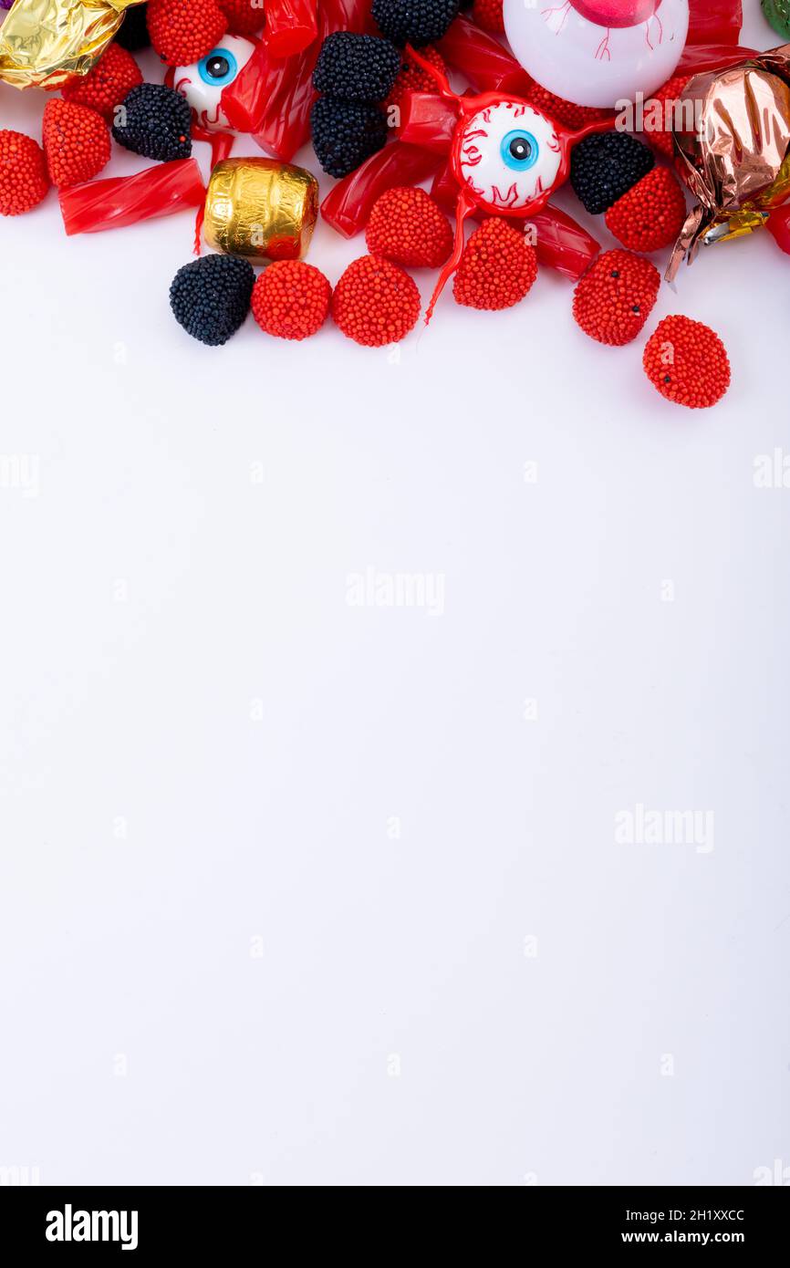 Composition of multiple halloween trick or treat eyeball sweets with ...