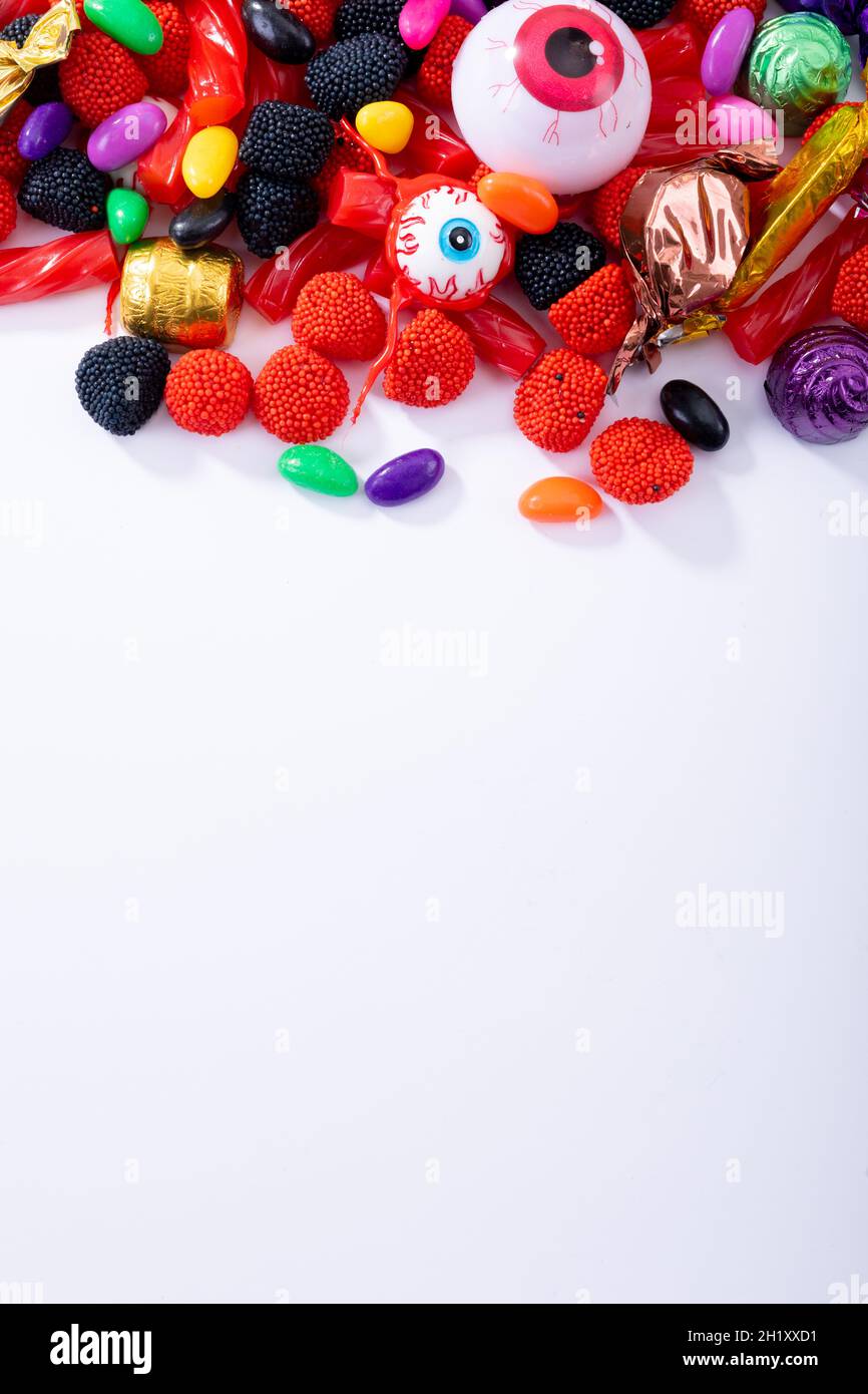Composition of multiple halloween trick or treat eyeball sweets with ...