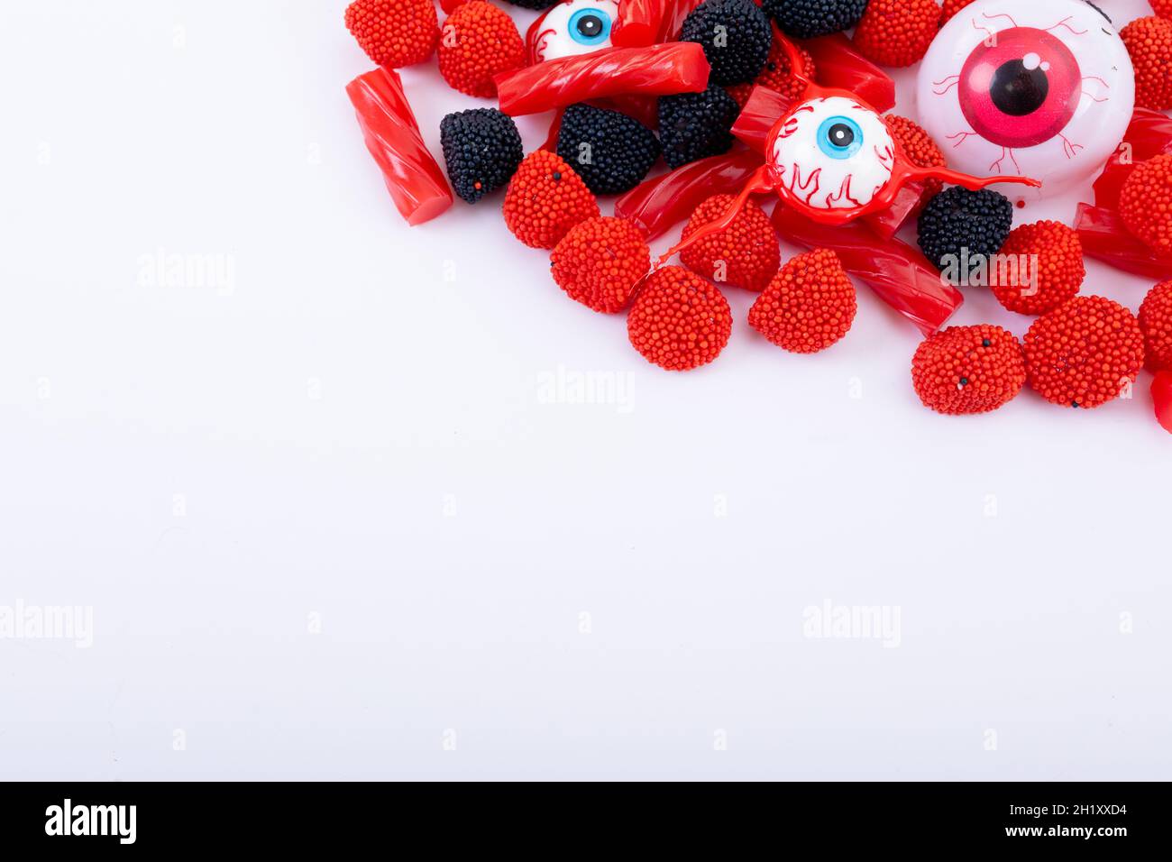 Composition of multiple halloween trick or treat eyeball sweets with ...