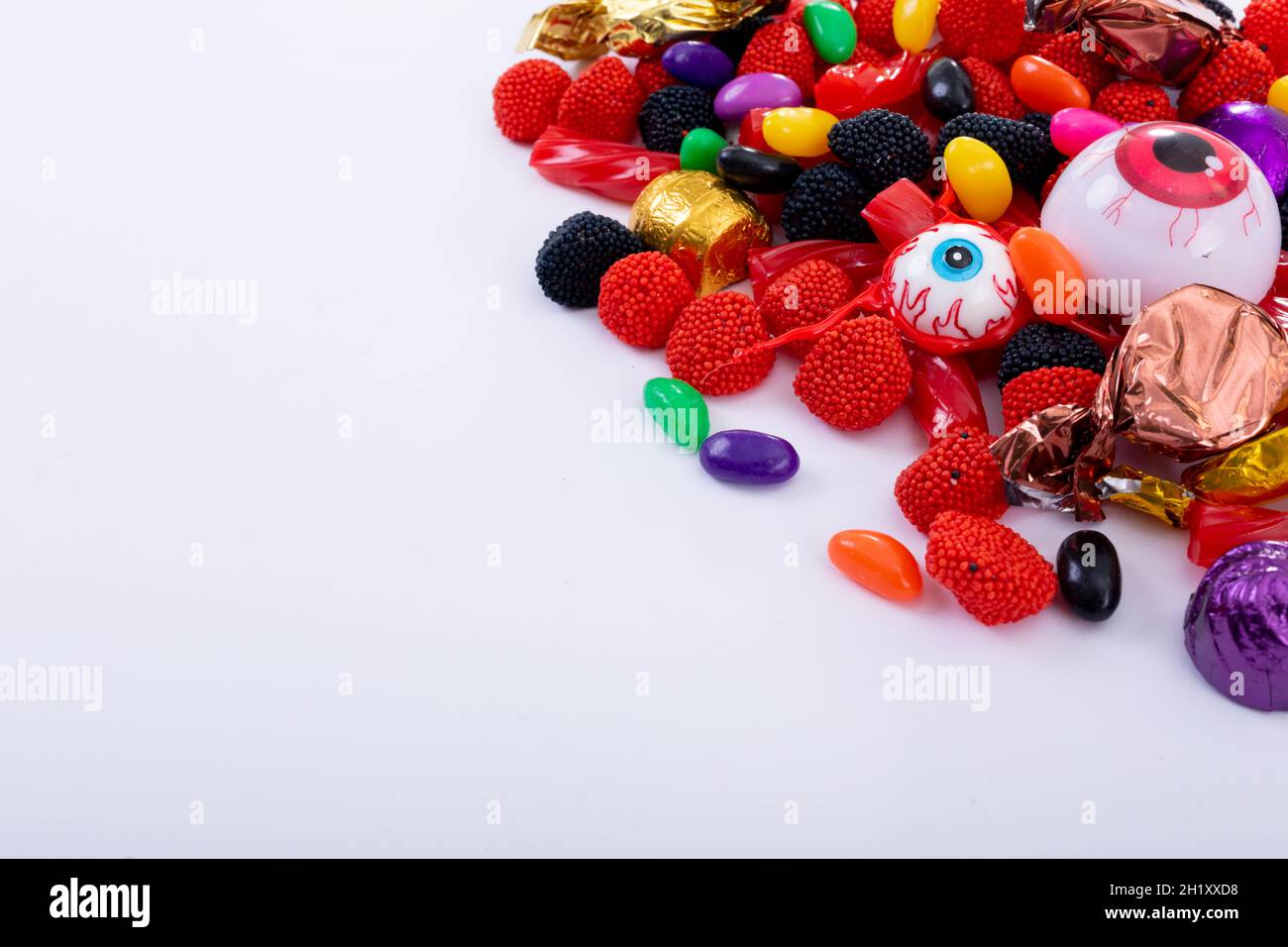 Composition of multiple halloween trick or treat eyeball sweets with ...