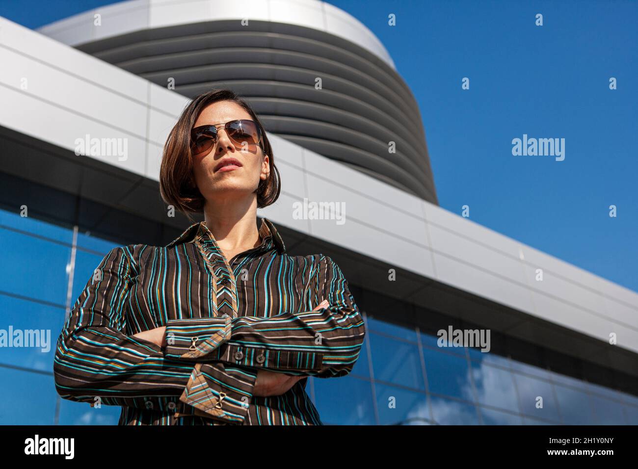 Businesswoman in office building hi-res stock photography and images ...