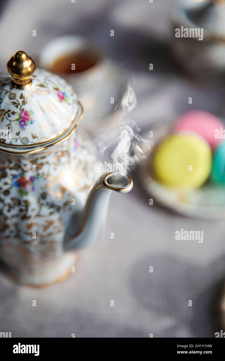 Traditional antique tea pot English culture afternoon tea with hot tea ...