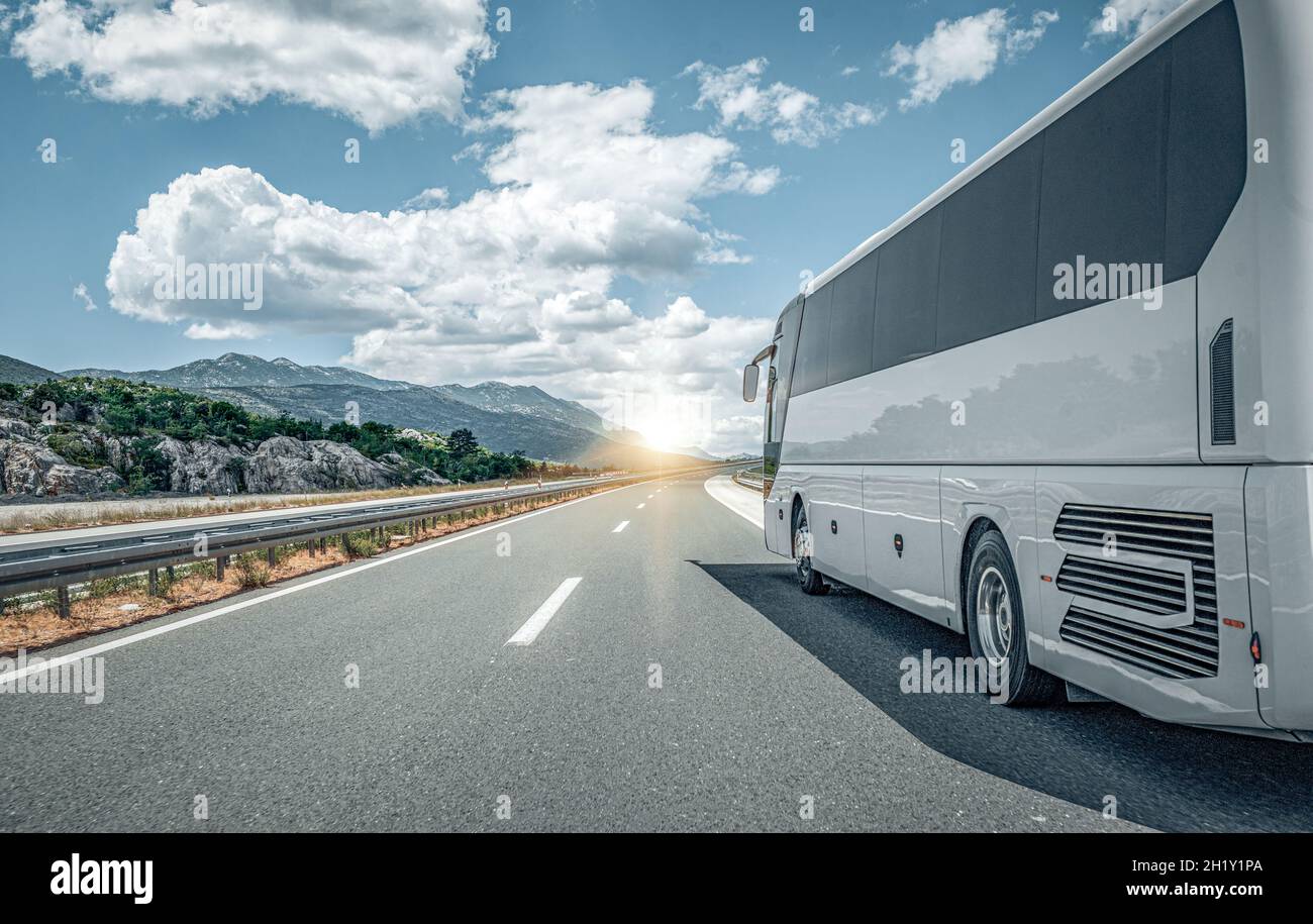 Passenger bus on the highway against the backdrop of a beautiful ...