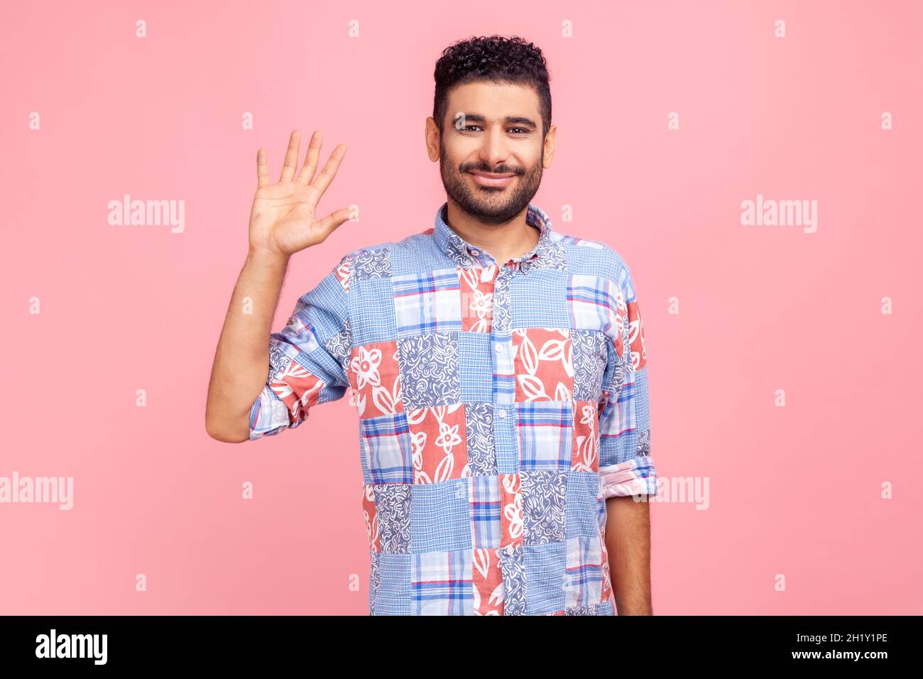 Indian man waving hi-res stock photography and images - Alamy