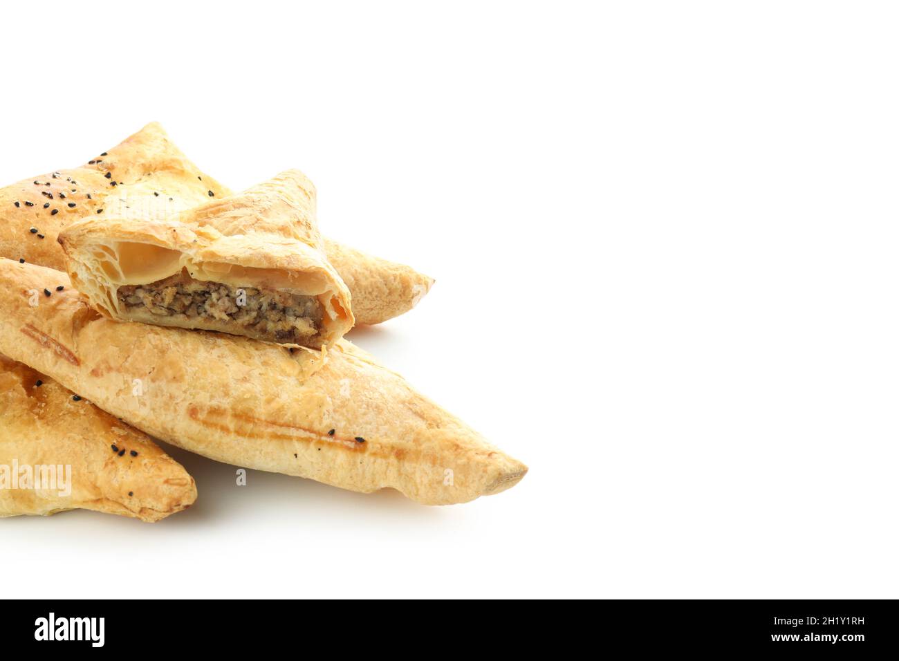 Golden crispy samsa isolated on white background Stock Photo - Alamy
