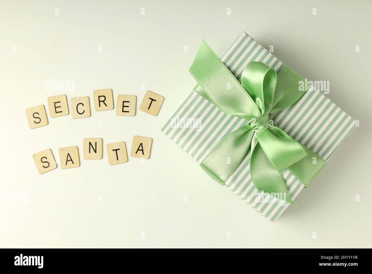 Secret Santa and Christmas composition on white background Stock Photo ...
