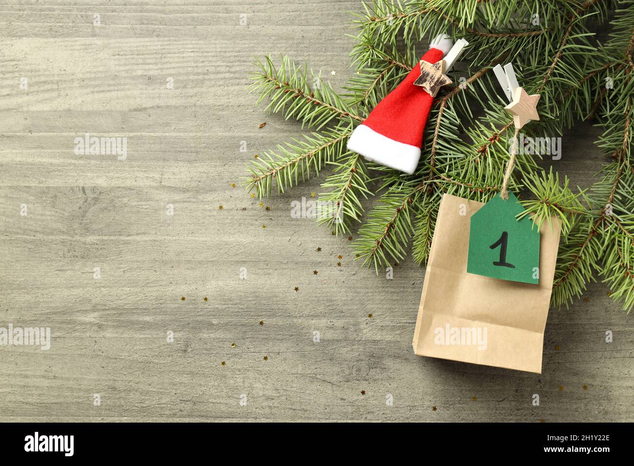 Concept of Advent calendar gift on gray wooden background Stock Photo ...
