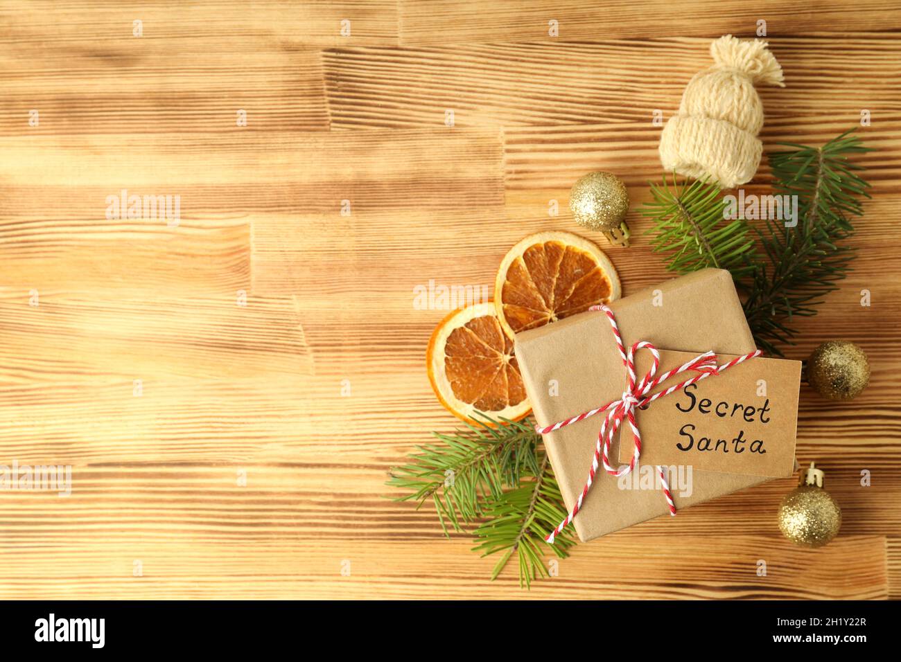 Secret Santa and Christmas composition on wooden background Stock Photo ...