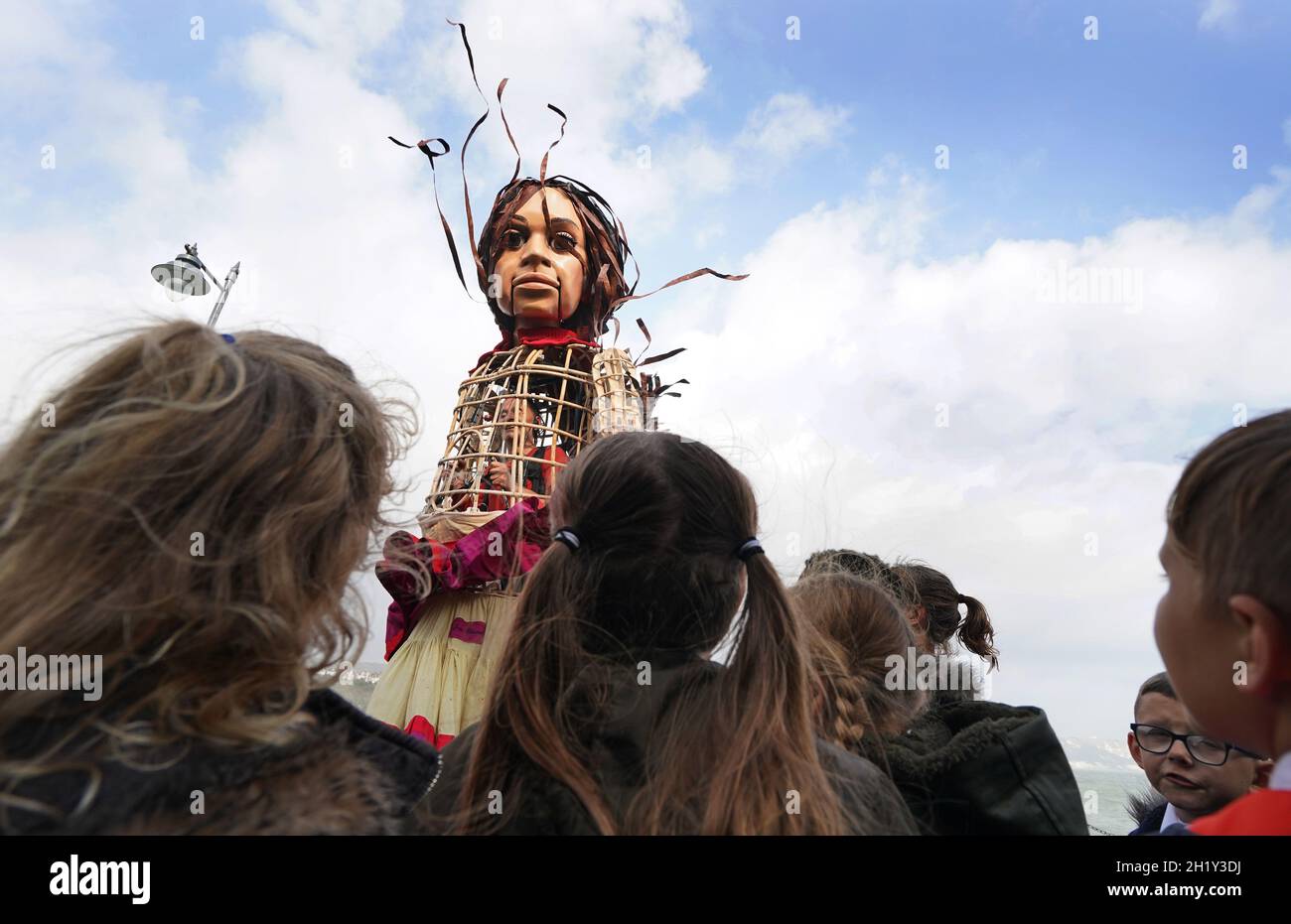 Little Amal, a 3.5-metre-tall puppet of a nine-year-old Syrian girl, is ...