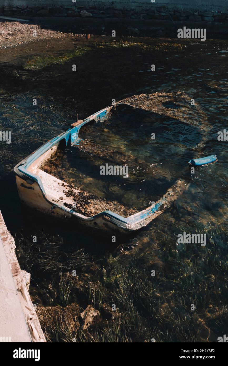Half sunken fishing boat hi-res stock photography and images - Alamy