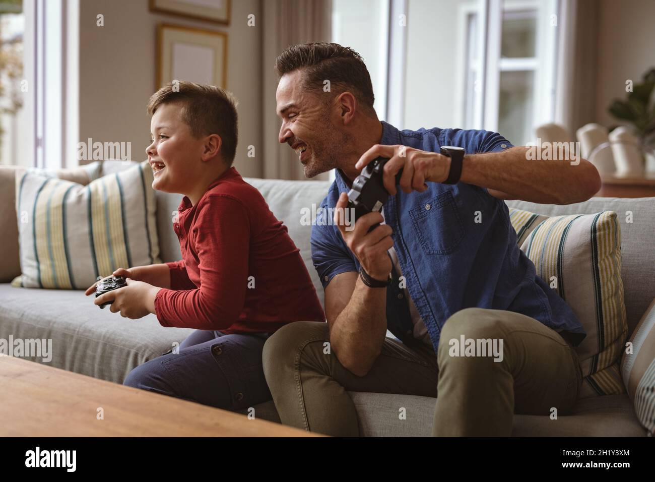 Mother son playing video games hi-res stock photography and images - Alamy