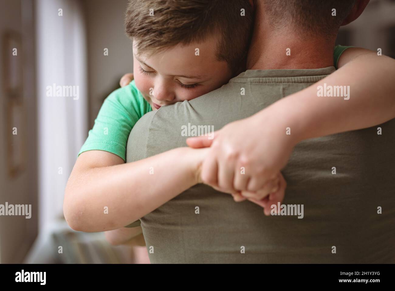 Close hugging hi-res stock photography and images - Alamy