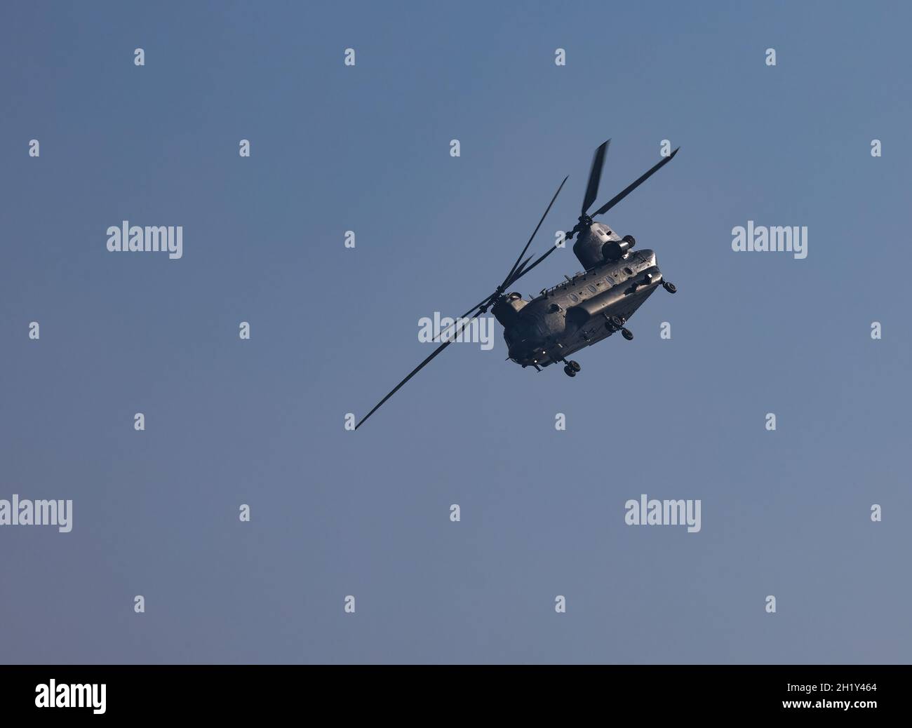 Chinook helicopter against a blue sky Stock Photo - Alamy