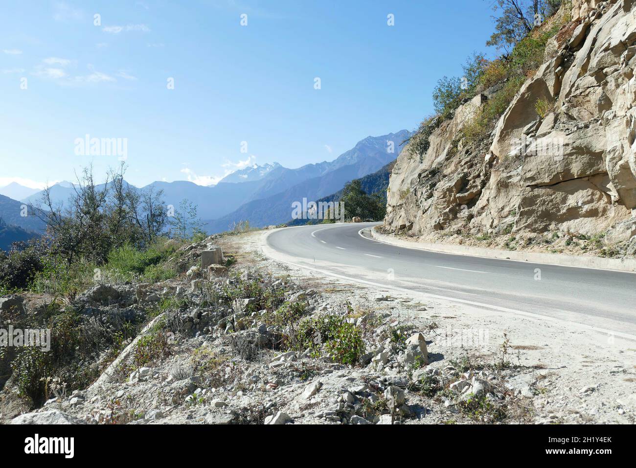 Beautiful view of a steep mountain road in Bhutan, Himalaya Stock Photo ...