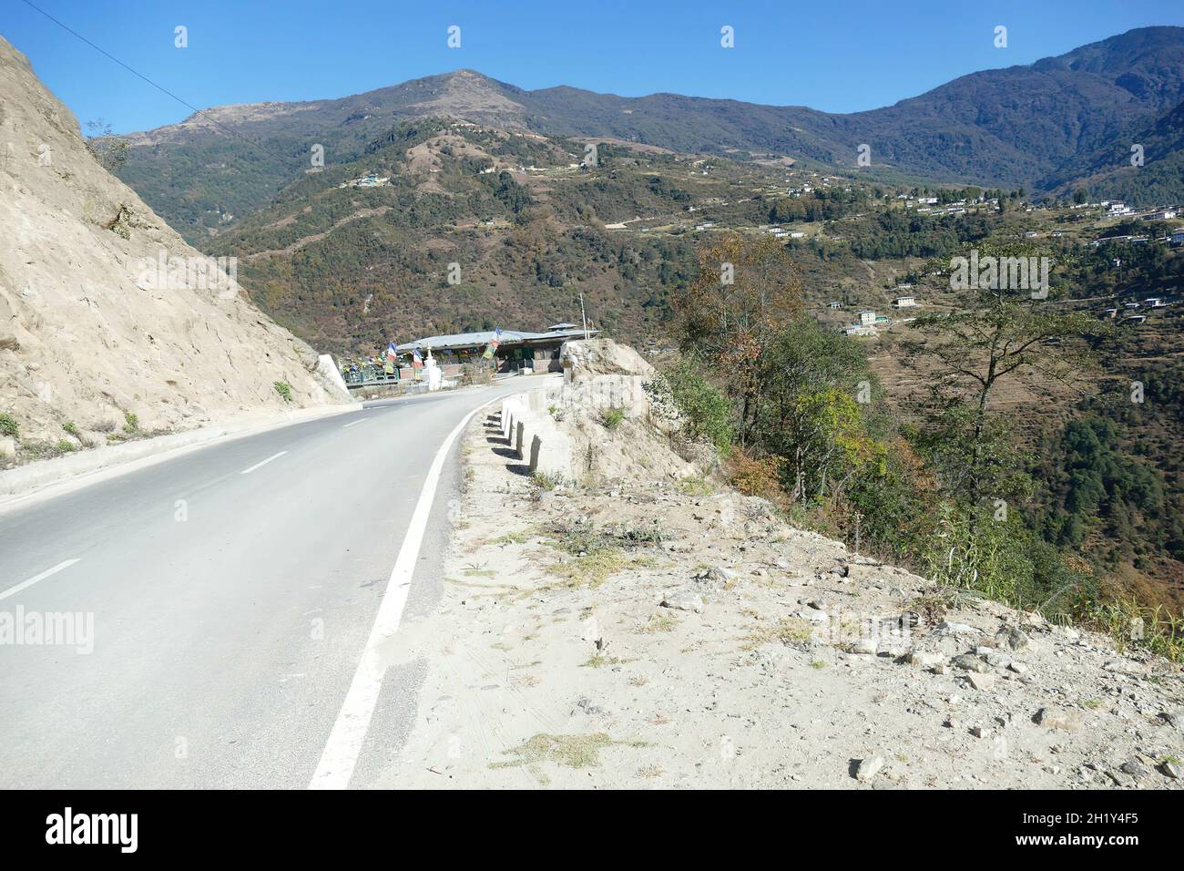 Beautiful view of a steep mountain road in Bhutan, Himalaya Stock Photo ...