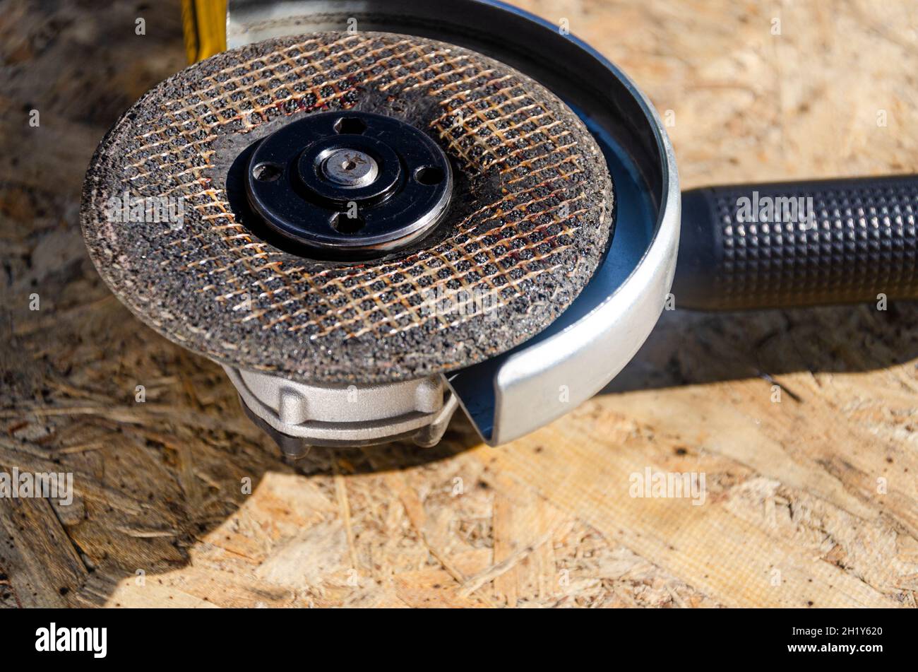 Electric grinder on the working table ready to be used. Heavy industry ...