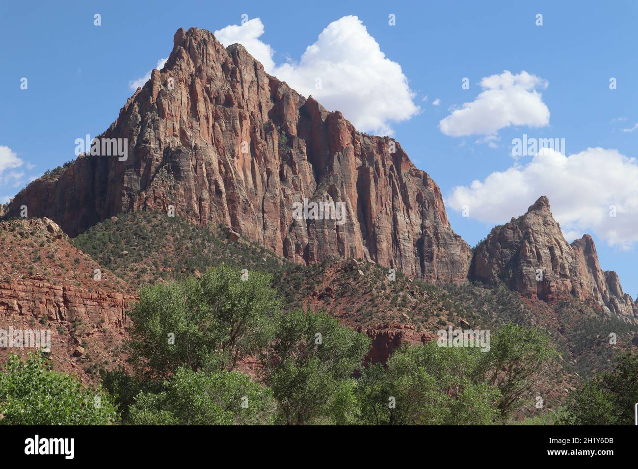 Serene view of the Watchman Mountain among rugged layered rock ...