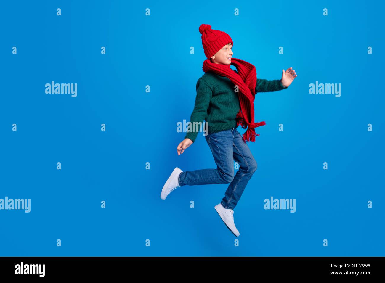 Full length body size photo boy jumping up looking copyspace isolated ...