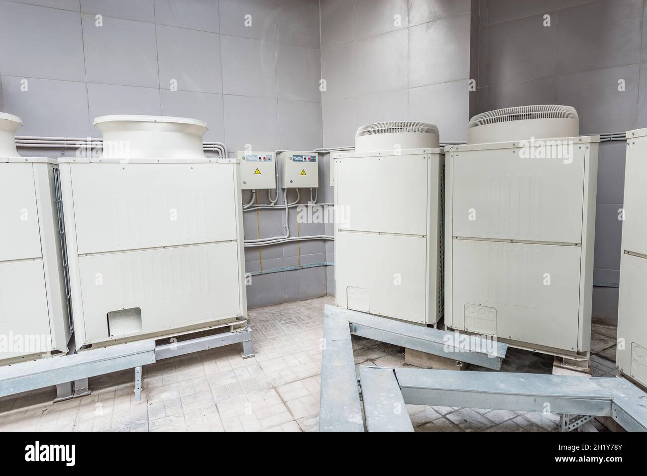 Air conditioning system assembled and installed on top of the building ...