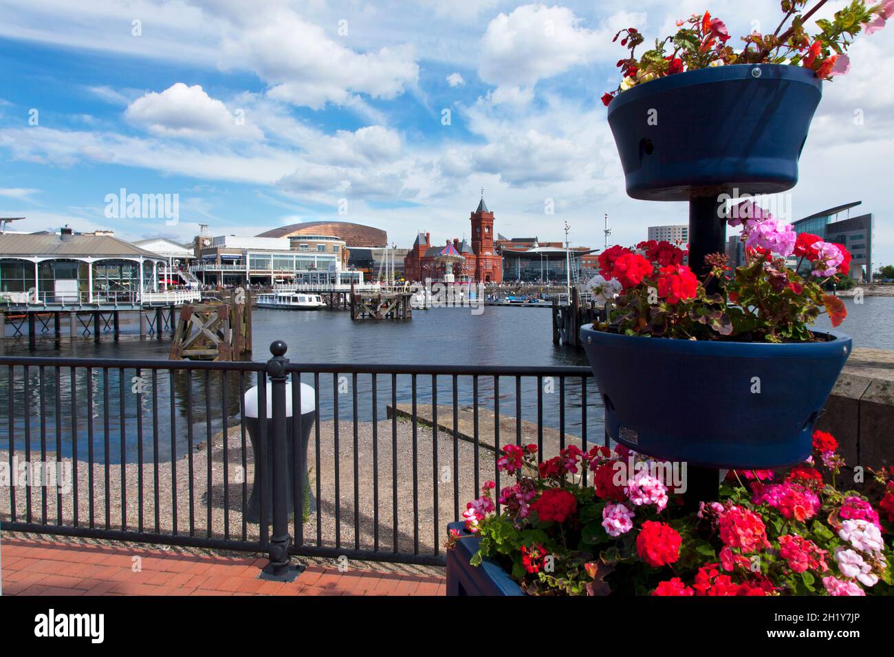 Cardif Bay flower display railings red brick pierhead building Senedd ...