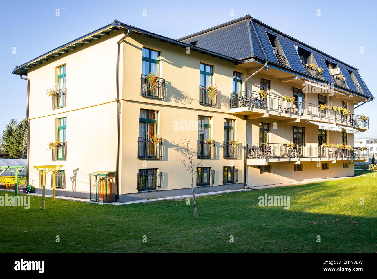 Suburban house building with flats Stock Photo - Alamy