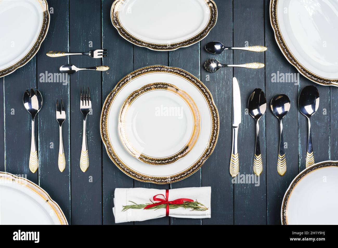 Top view of table setup on dark wooden background Stock Photo - Alamy