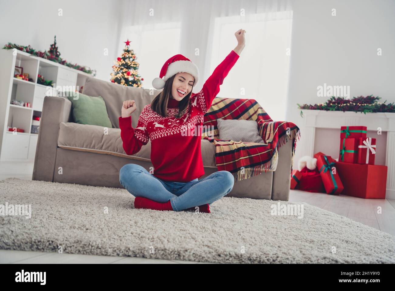 Full body photo of young cheerful girl sit floor have fun rejoice new ...