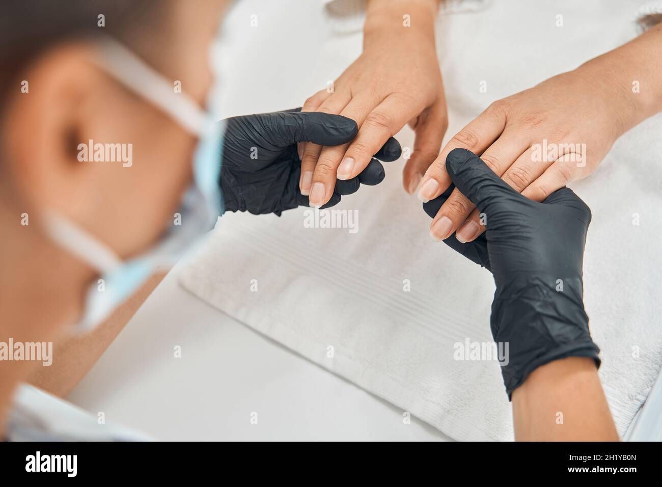 Checking nails hand hi-res stock photography and images - Alamy