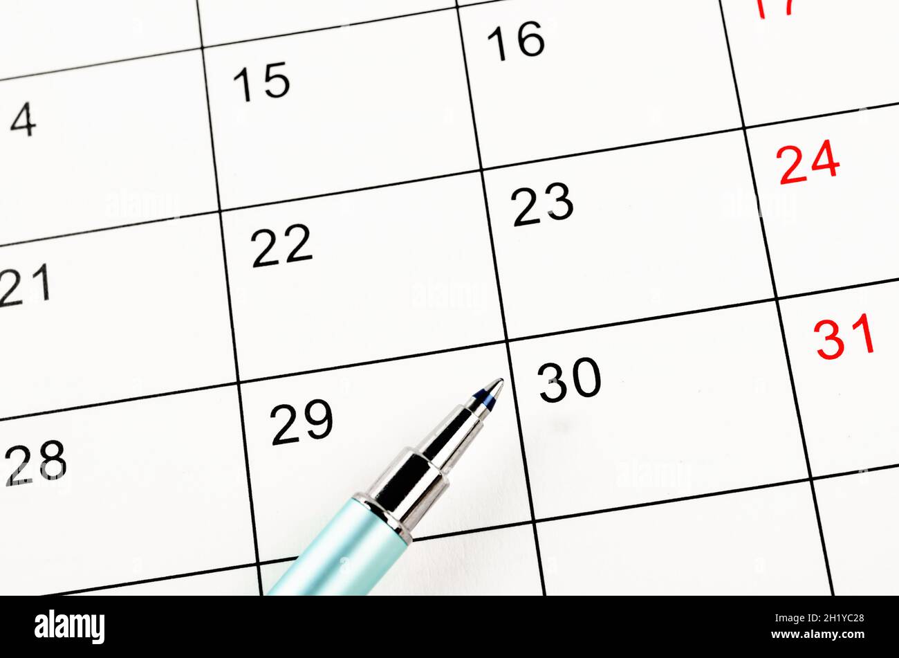 The pen on a blank calendar for your text or message Stock Photo - Alamy