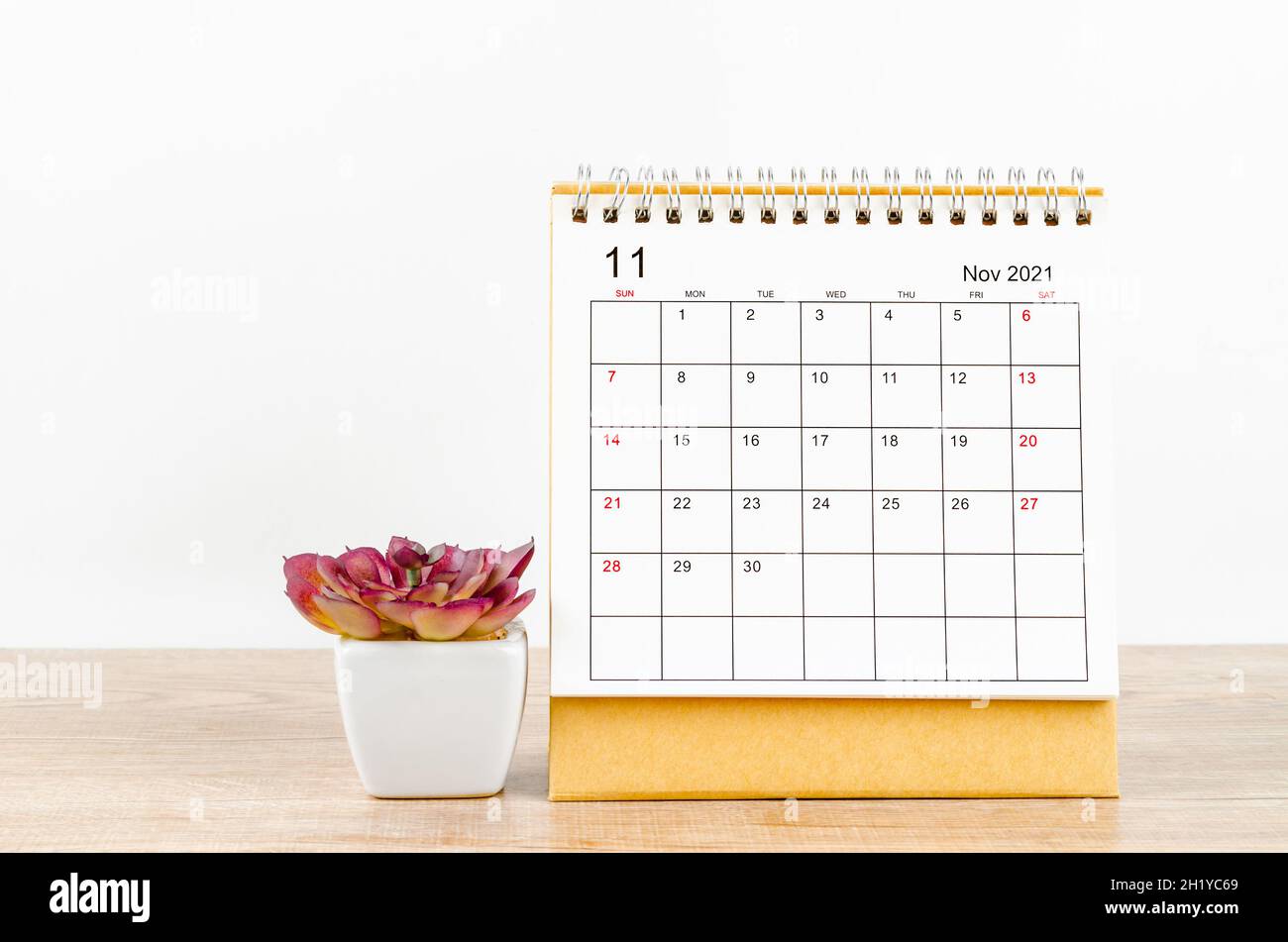 The November desk calendar 2021 on wooden background Stock Photo - Alamy
