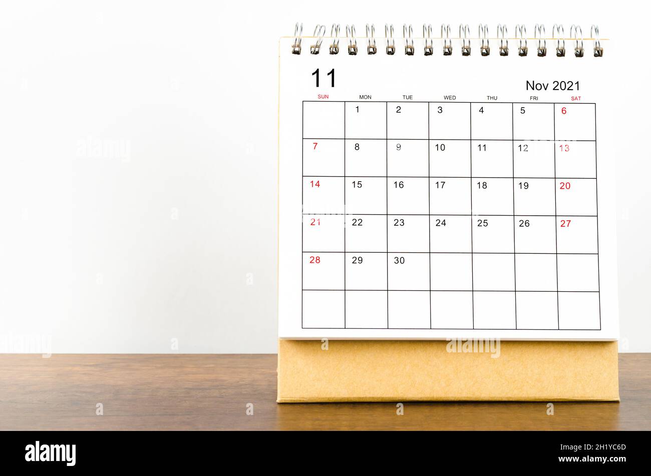 November desk calendar 2021 on wooden background Stock Photo - Alamy
