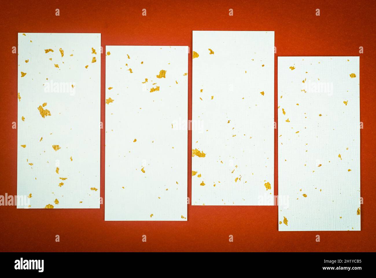 Paper with gold sheet texture on red background for your text or ...