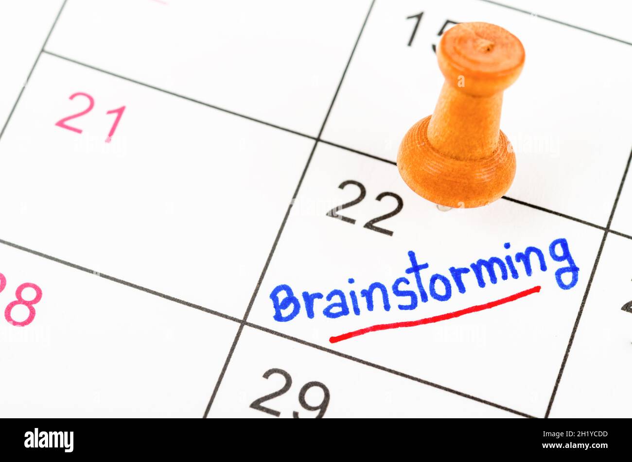 Handwritten Brainstorming for reminde apointment with wooden pin on a ...