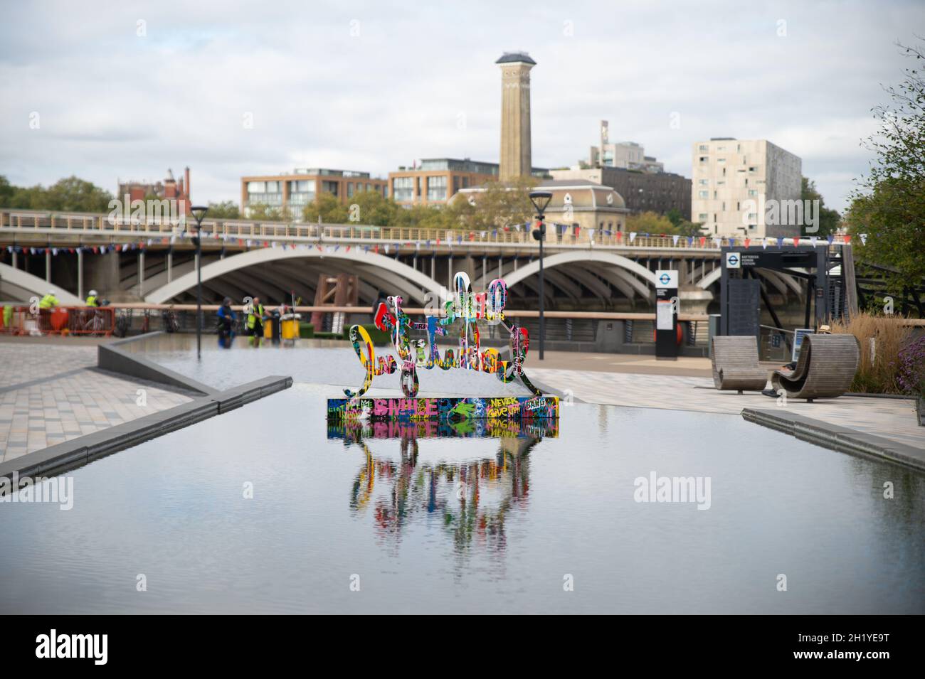 A water feature and artwork at Battersea Power Dtation Stock Photo - Alamy