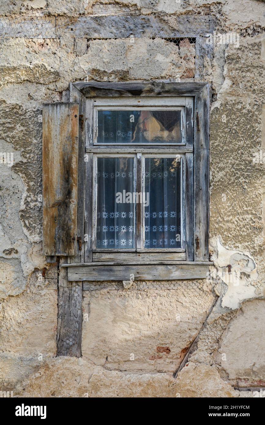 An old window on the house, witness to the past Stock Photo - Alamy