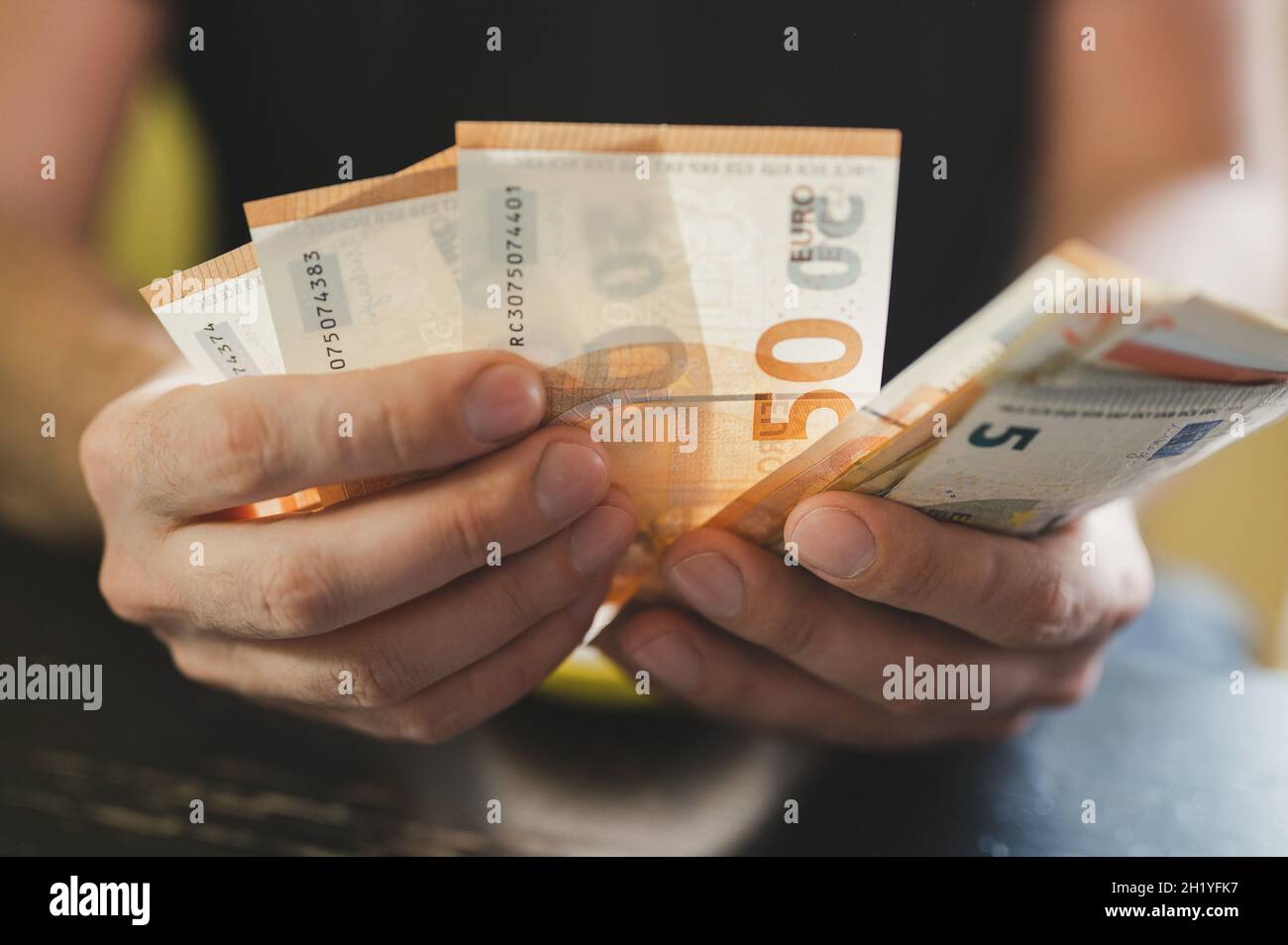 business man counting money. rich male hands holds and count cash ...