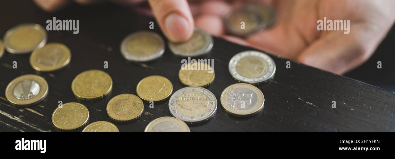 business man counting money. rich male hands holds and count coins of ...