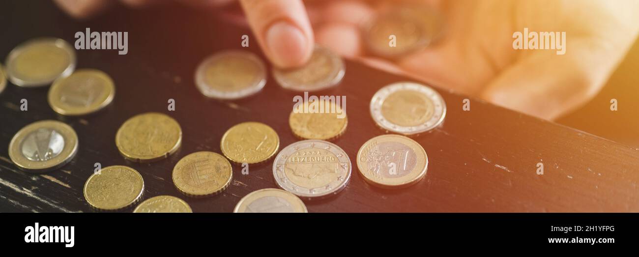 business man counting money. rich male hands holds and count coins of ...