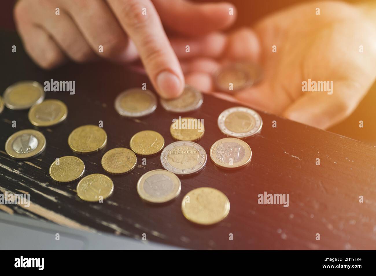business man counting money. rich male hands holds and count coins of ...