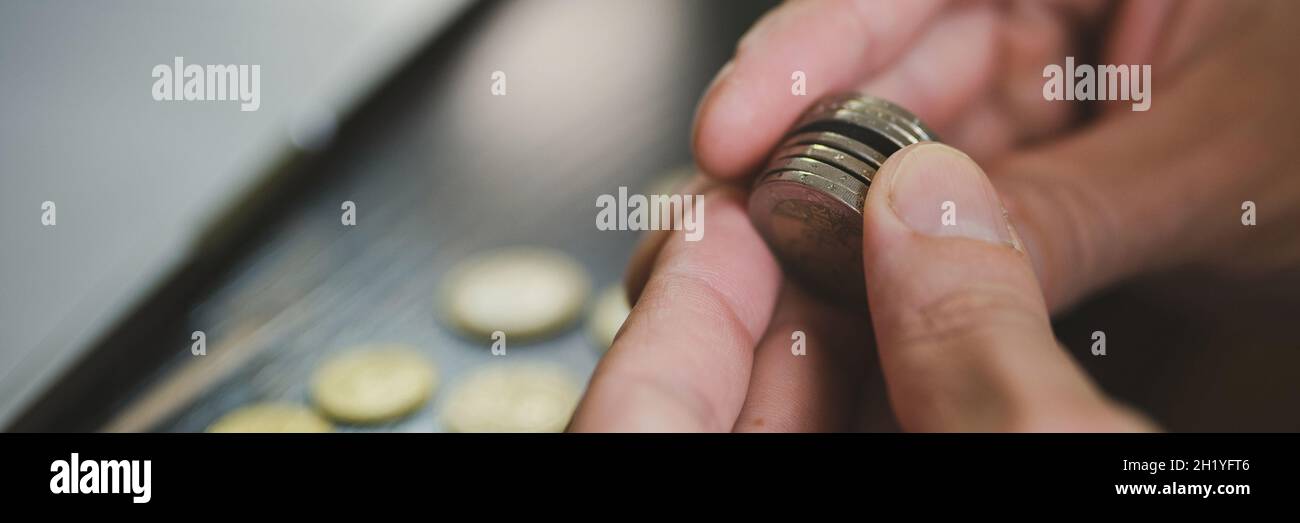 business man counting money. rich male hands holds and count coins of ...