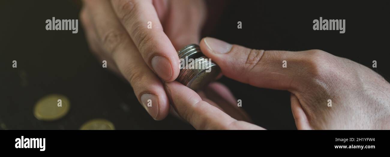 business man counting money. rich male hands holds and count coins of ...