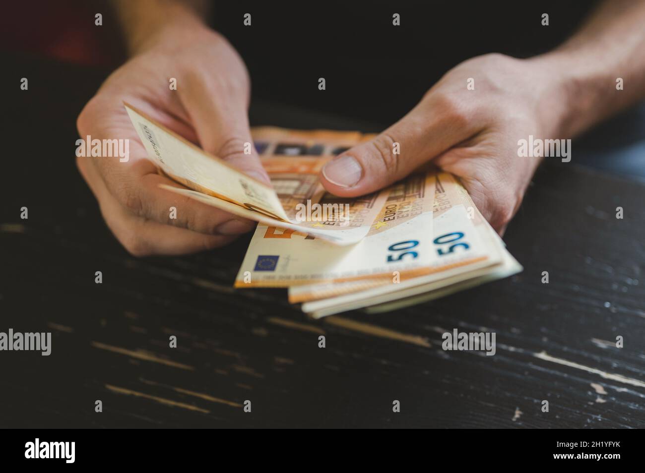 business man counting money. rich male hands holds and count cash ...
