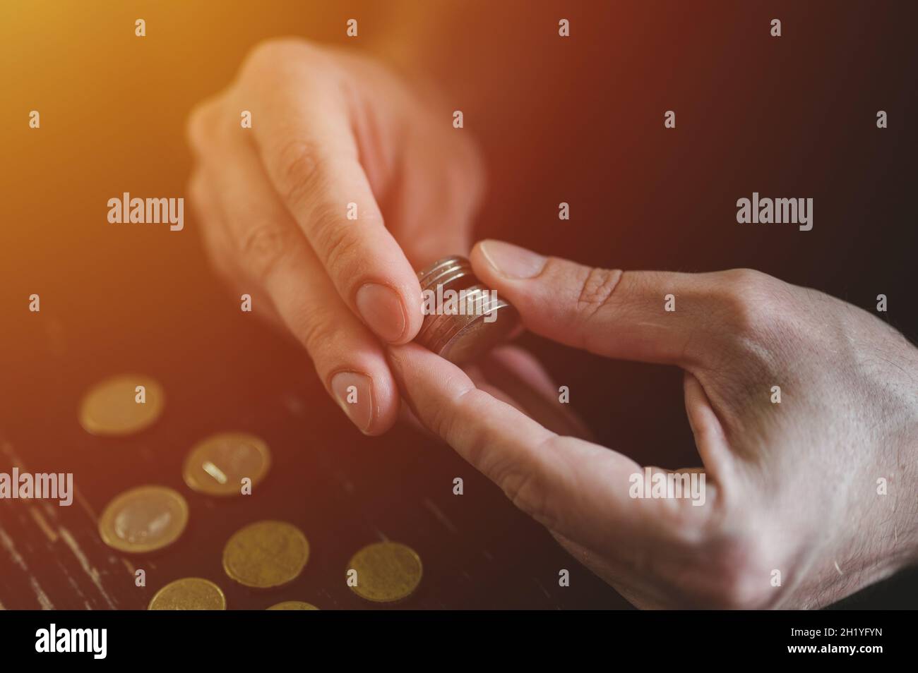 business man counting money. rich male hands holds and count coins of ...