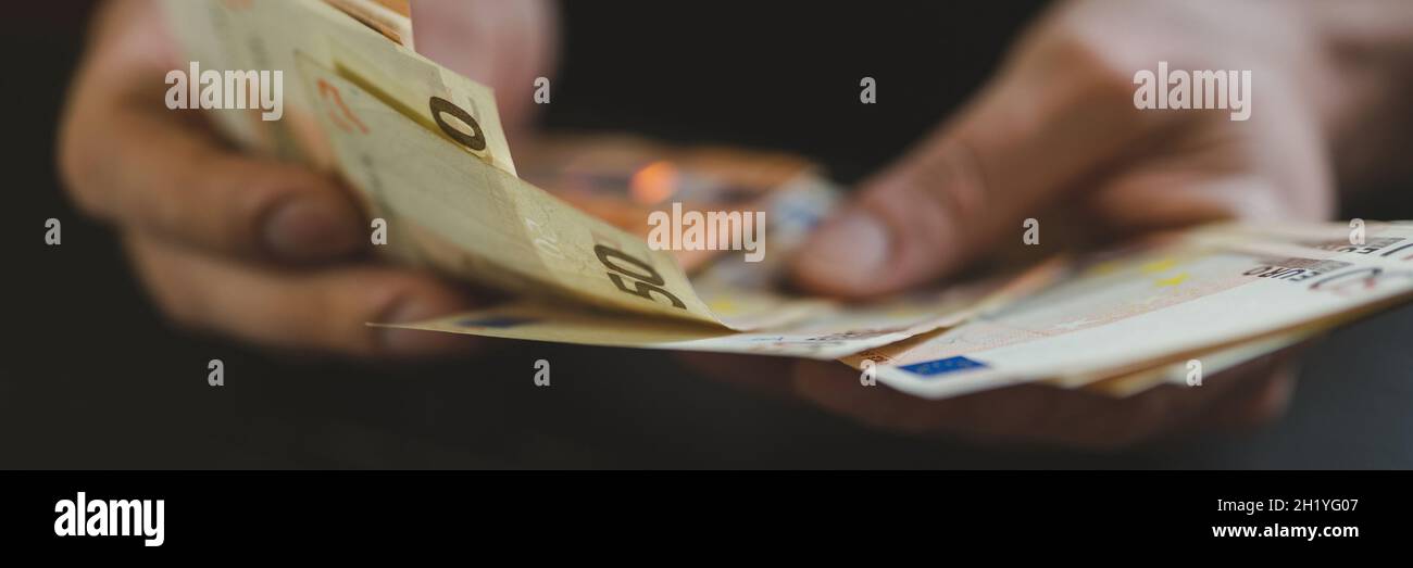 business man counting money. rich male hands holds and count cash ...