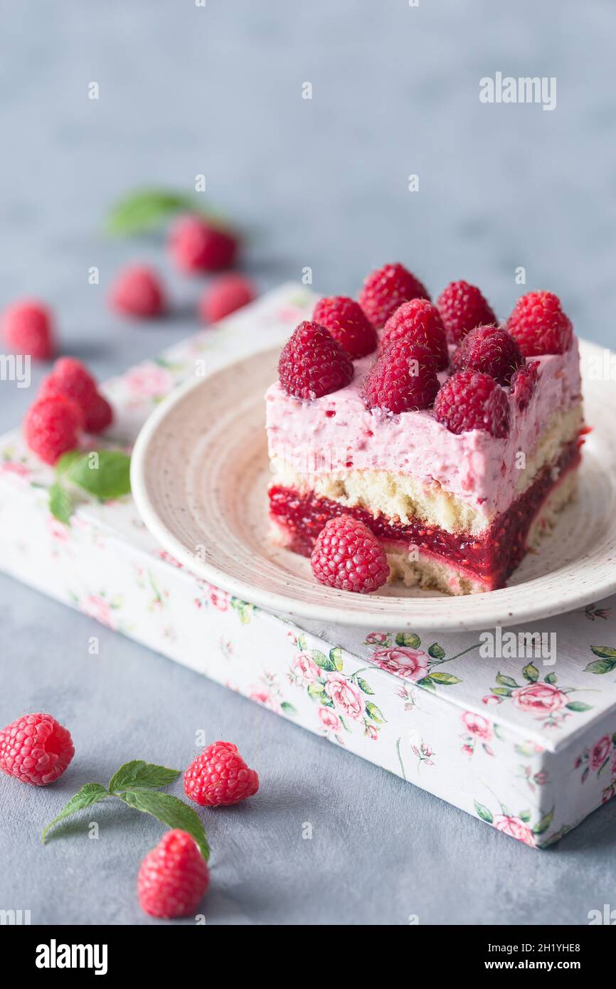 Slice of a raspberry no bake cream cake Stock Photo - Alamy