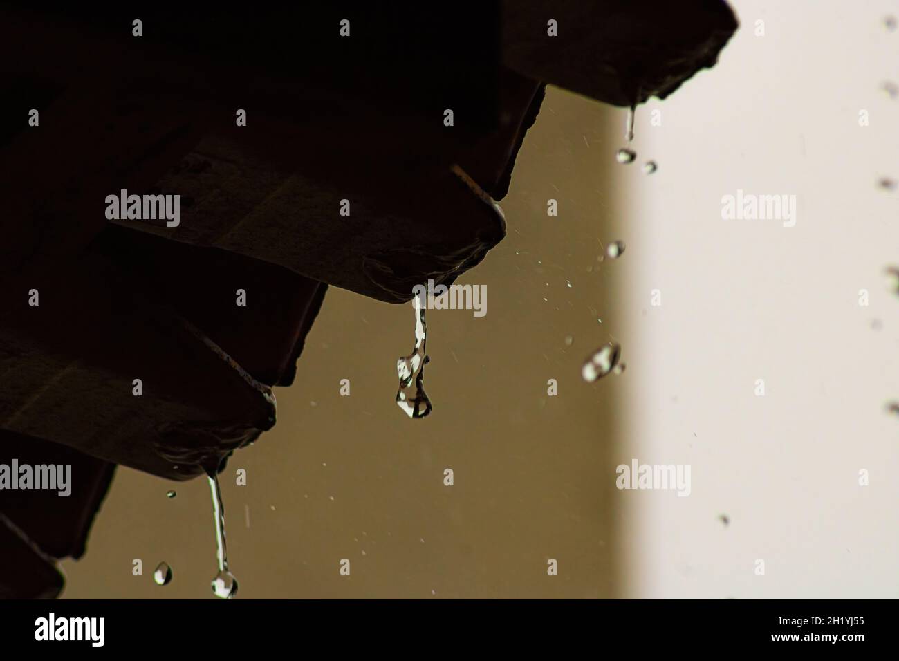 Raining rooftop hi-res stock photography and images - Alamy