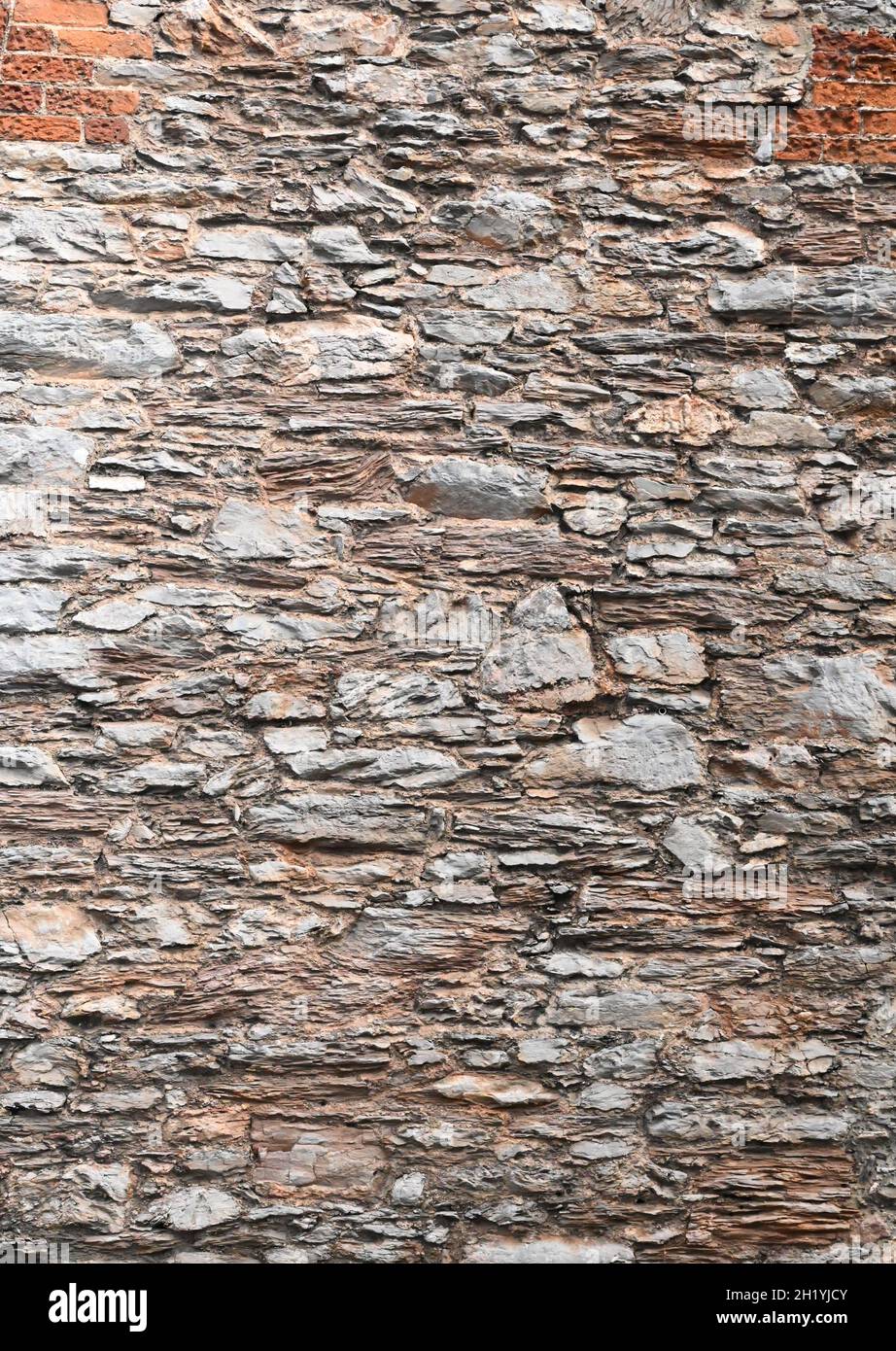 Old stone wall texture background Stock Photo - Alamy