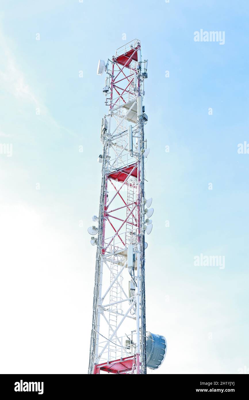 Telecommunications tower with many different antennas for transmitting ...