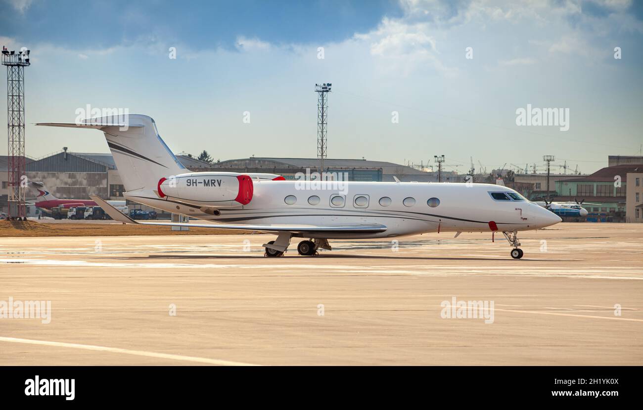 Plane Gulfstream Aerospace Gulfstream G-7 9H-MRV. Small white airplane ...